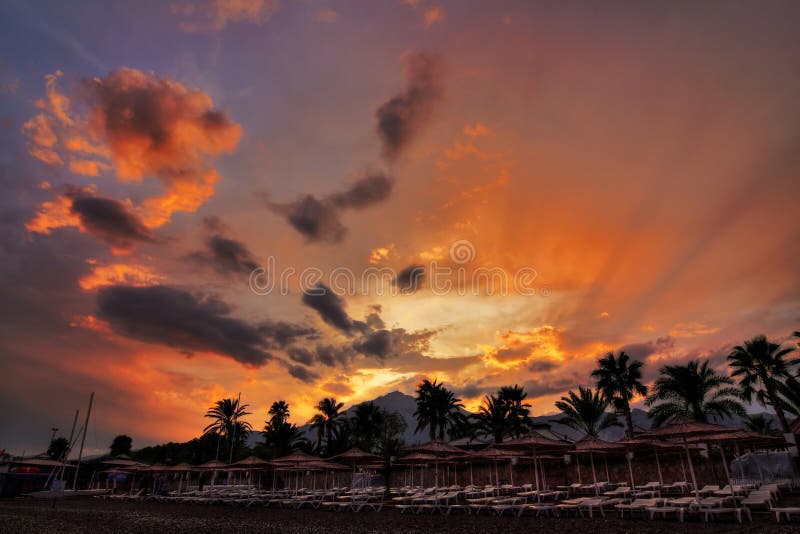 Mountain beach sunset stock photo. Image of beach, beds - 21960360