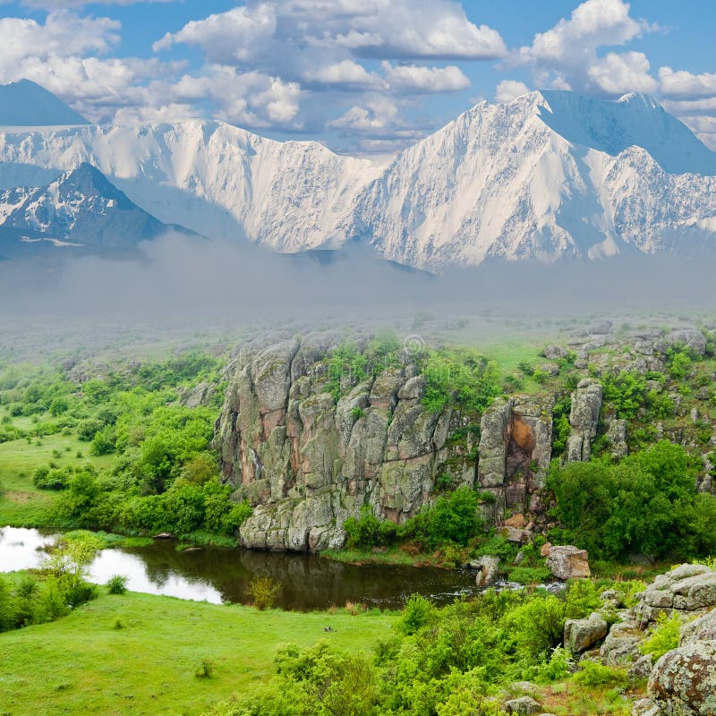 Mountain Beyond a Green Valley Stock Photo - Image of panoramic, calm ...