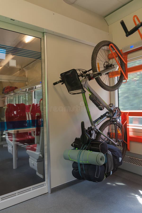 Mountain Bike with Saddlebags is Transported in the Train. Stock Image ...
