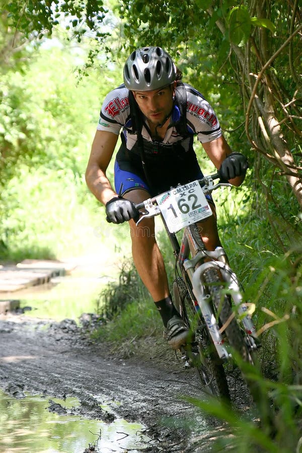 Mountain biker in action editorial photo. Image of rico - 4239726