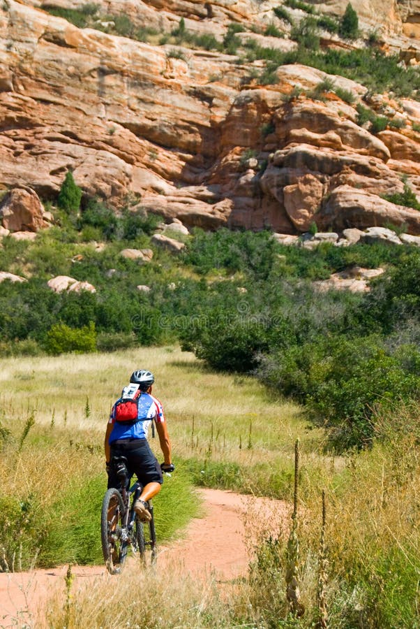 Mountain Biker Begins a Difficult Trail Stock Photo - Image of ...