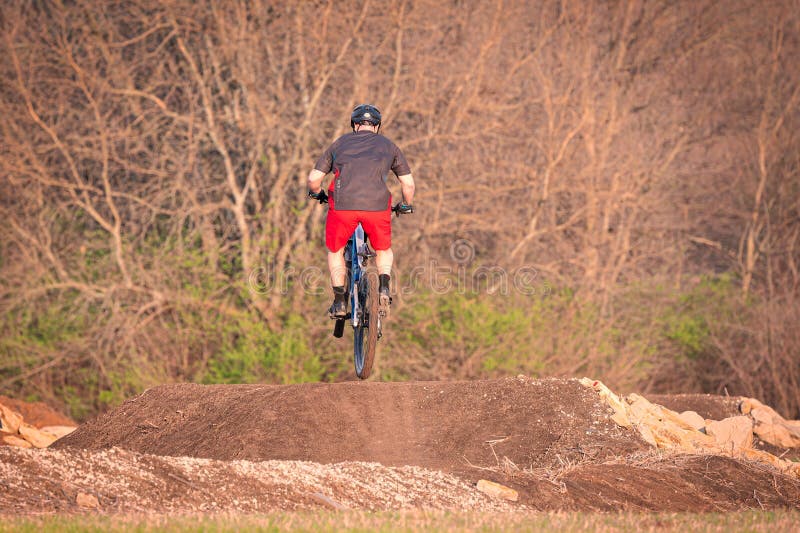 Mountain Biker Mid-air on Downhill Trail. Editorial Image - Image of ...