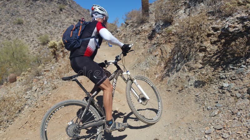 Mountain Biker Riding Uphill in the Desert Editorial Stock Photo ...