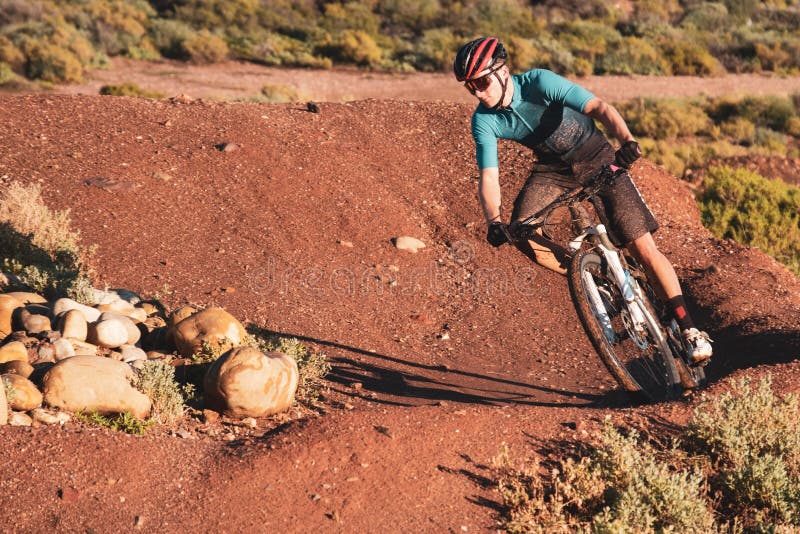 Mountain Biker Riding on a Single Track Stock Image - Image of helmet ...