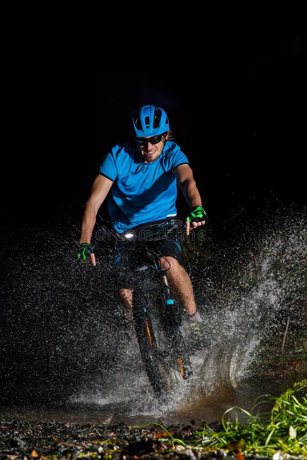 Mountain Biker Running through Water Stock Image - Image of adventure ...