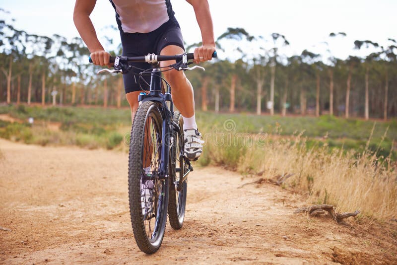 Mountain Biking is Addictive. a Cyclist Riding Outdoors. Stock Image ...