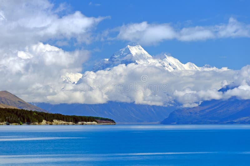 Mountain Breaking through the Clouds Stock Image - Image of south, peak ...