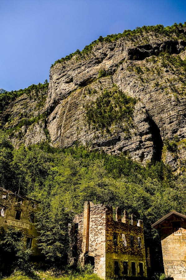 A Mountain with a Building in the Foreground Stock Image - Image of ...