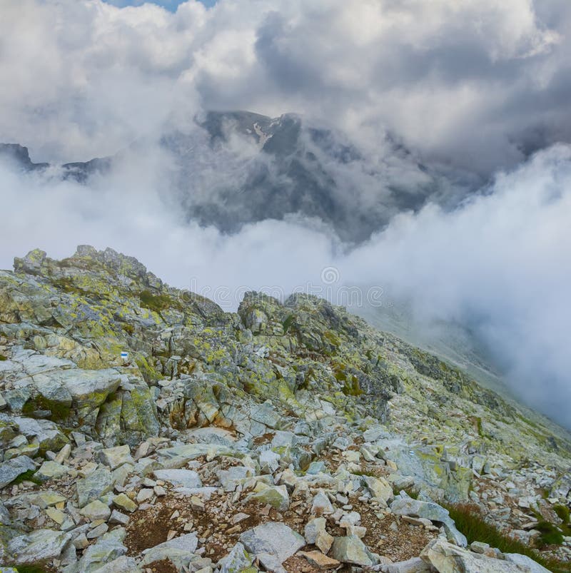 Mountain Chain in Dense Mist Stock Photo - Image of precipice, scene ...