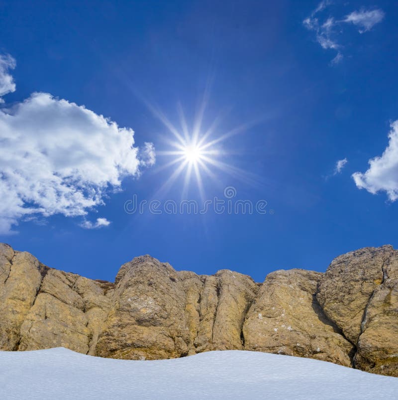 Mountain Chain in Snow Under a Sun Stock Photo - Image of sunbeam ...