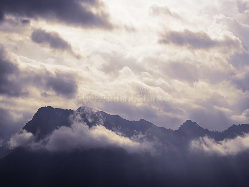 Mountain Chain Topped by Clouds Stock Image - Image of horizon, chain ...