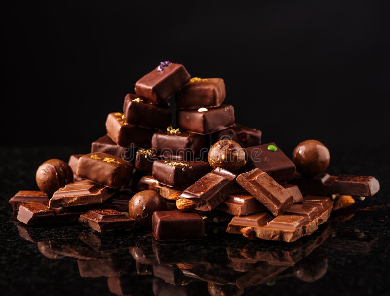A Mountain of Chocolate Bars Stock Photo - Image of candy, black: 1945538