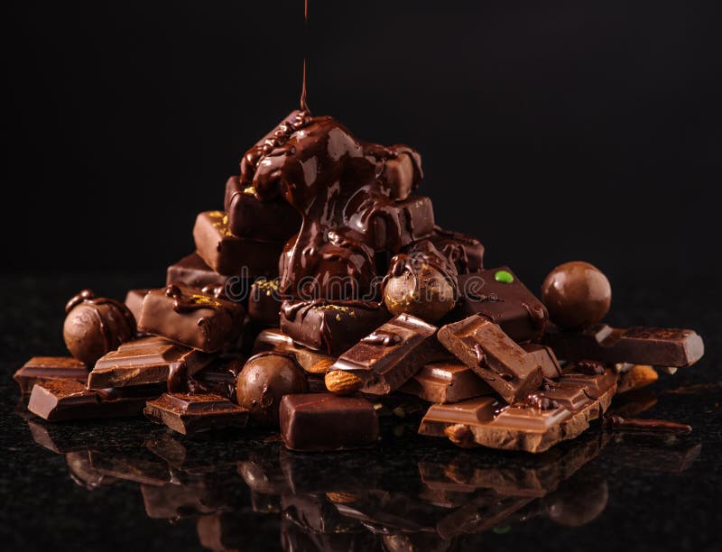 Mountain of Chocolate and Chocolates Candys. Stock Image - Image of ...