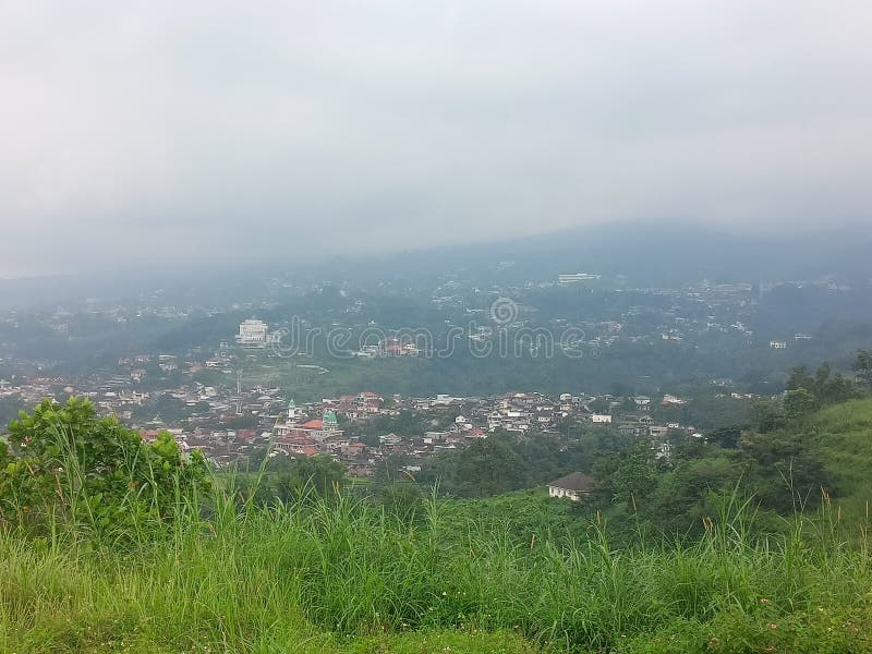 Mountain City Shrouded in Morning Mist Stock Image - Image of shrouded ...