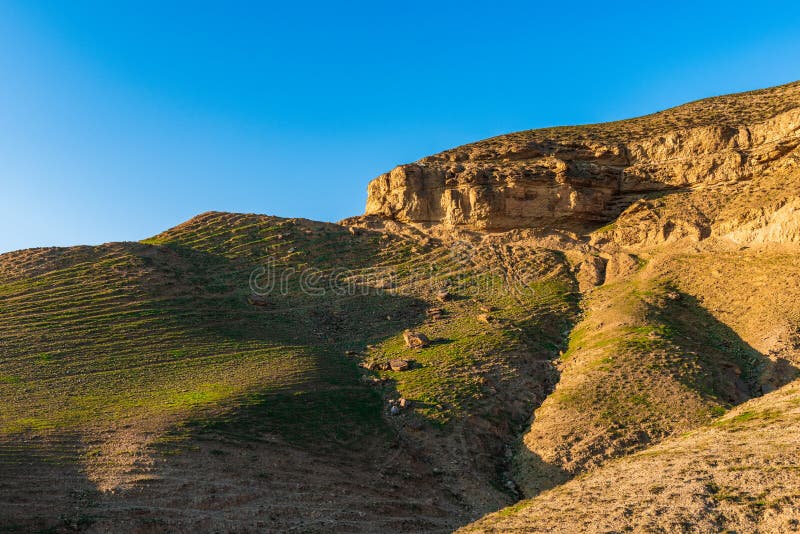 Mountain Cliff with Falling Stones Stock Image - Image of layered ...