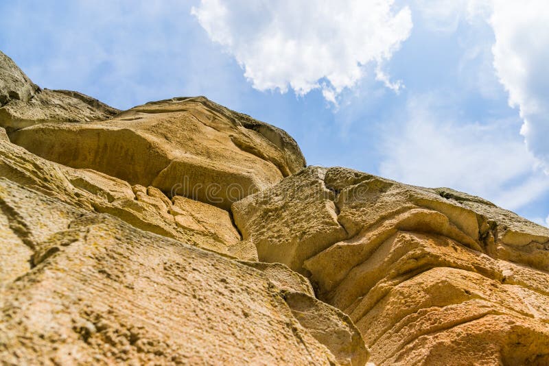 Mountain Cliff with Rocks and a Blue Cloudy Sky, Nature Background ...