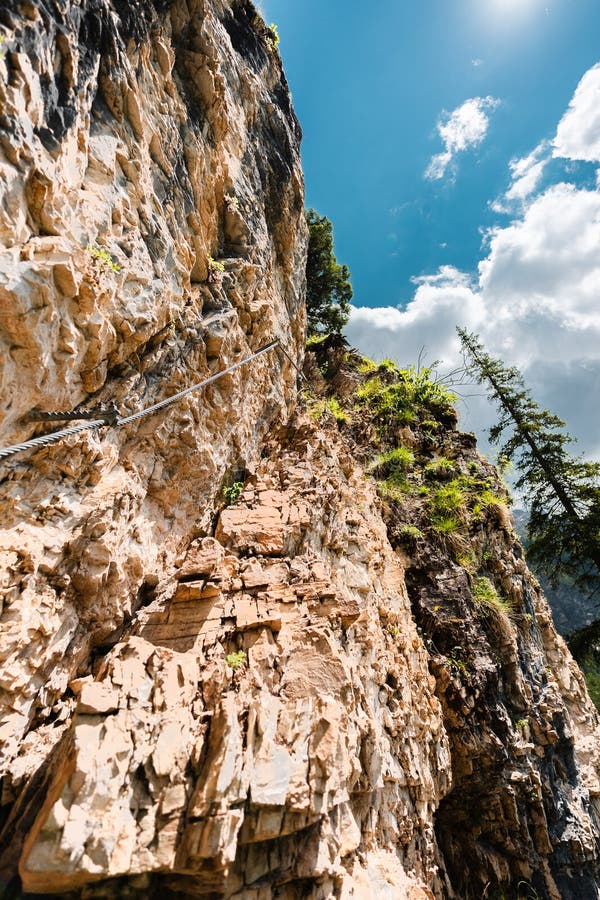 Mountain Cliff with a Steel Climbing Wire Cable Leading Up Stock Image ...