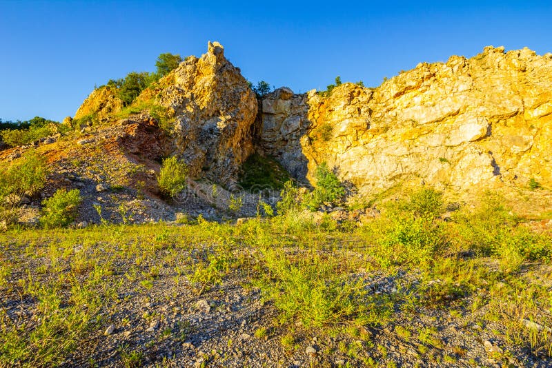 Mountain Cliffs and Flat Terrain Stock Photo - Image of boulder ...