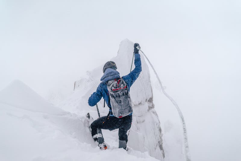 Mountain Climber Climbing the Snow Covered Alps in Mont Blanc Massif ...