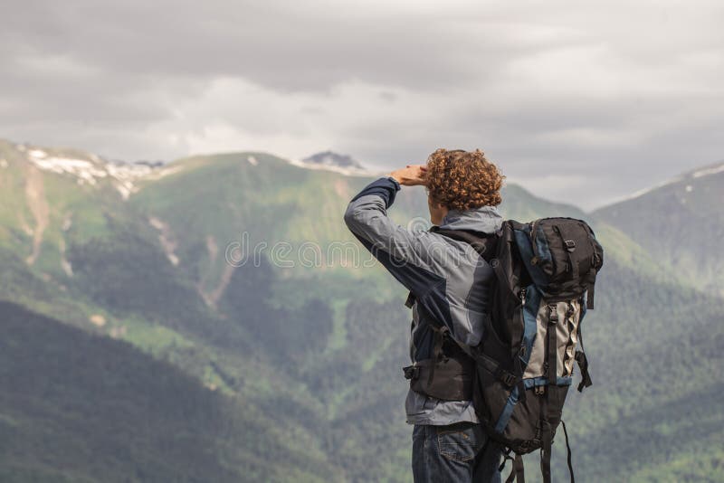 Mountain Climbing Concept. Adventurous Guy is Looking for the Way Stock ...