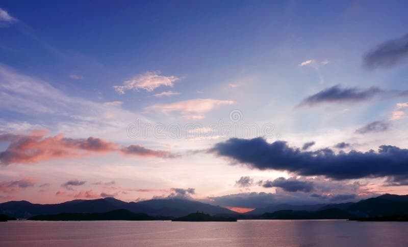 Mountain, Cloud, Gradient Sky and Ocean at Sunset Stock Photo - Image ...