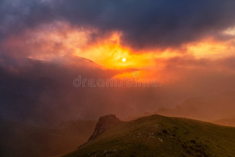 Mountain Dramatic Sunset in Clouds Stock Photo - Image of scenery ...