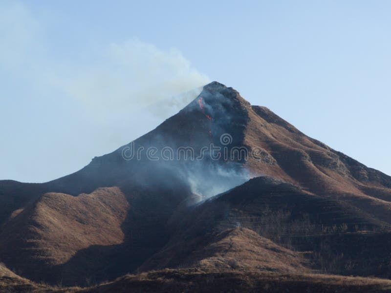 Mountain fire stock image. Image of wildfire, mountain - 148228923