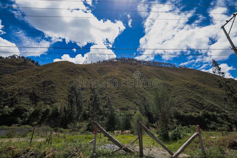Mountain Forest Under Blue Sky and White Clouds Stock Photo - Image of ...