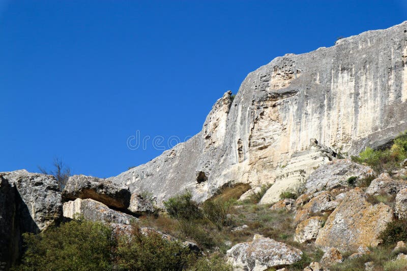 Mountain Formation - Limestone Cliff on Bright Blue Sky Background ...
