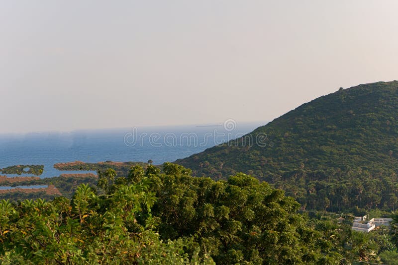 Mountain with Green Tree and Sea Water Stock Photo - Image of peaks ...
