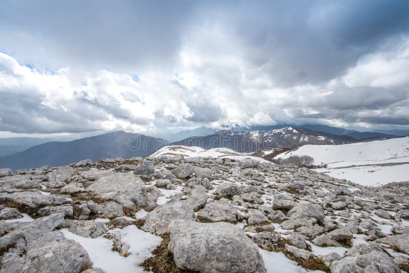 Snow-Covered Rocks stock photo. Image of snow, rocks - 72673798