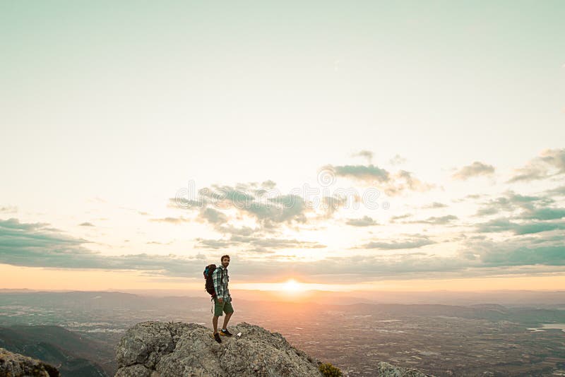 Mountain hiker at sunset stock photo. Image of sunset - 120891422