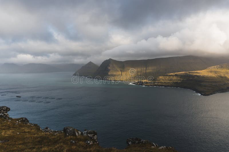 A Mountain on the Horizon Has a Body of Water Below Stock Image - Image ...