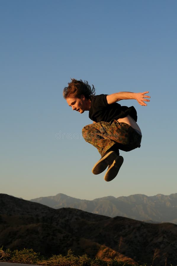 Mountain Jump stock image. Image of lifestyle, athlete - 5212343
