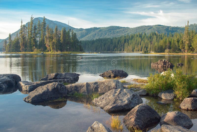 Mountain Lake with Big Rocks on Foreground Stock Image - Image of blue ...