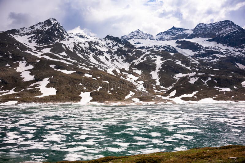 Mountain Lake with Ice in Switzerland in Spring Stock Image - Image of ...