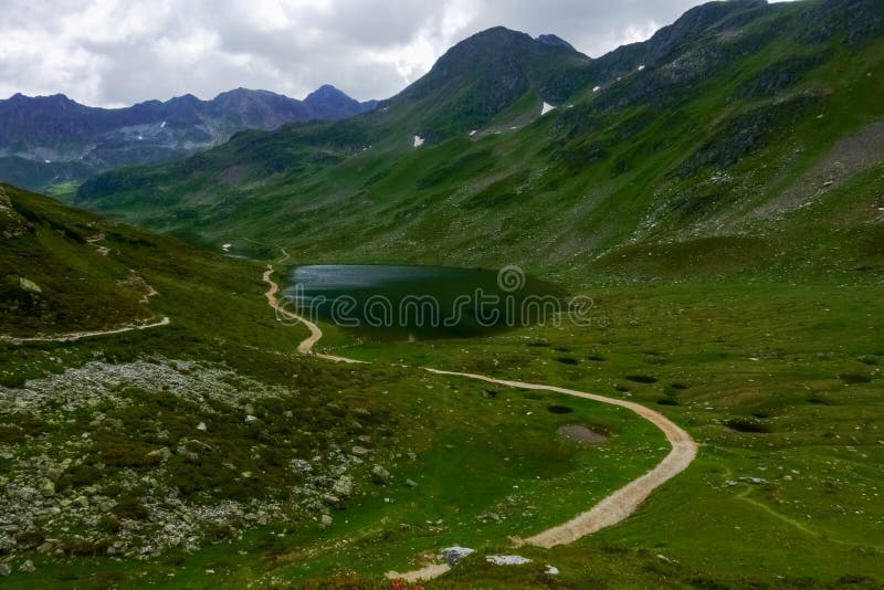 Mountain Lake with a Long Path for Hiking Stock Photo - Image of ...