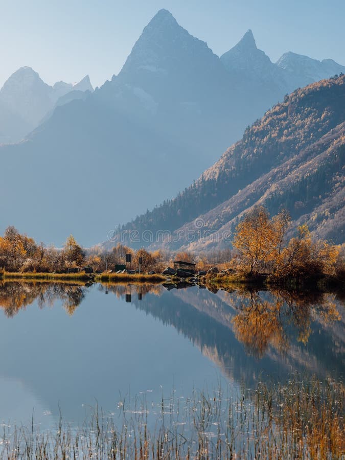 Mountain Lake with Reflection in Autumn Landscape and Peak of Mountain ...
