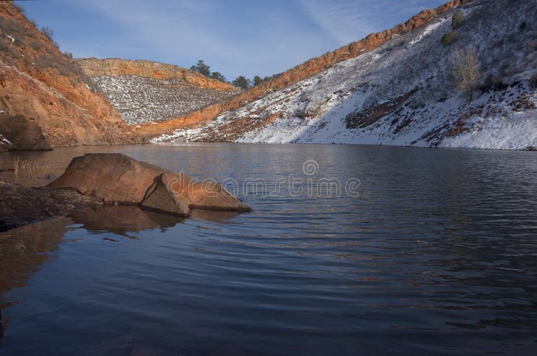 Mountain Lake with Sandstone Cliffs and Snow Stock Photo - Image of ...