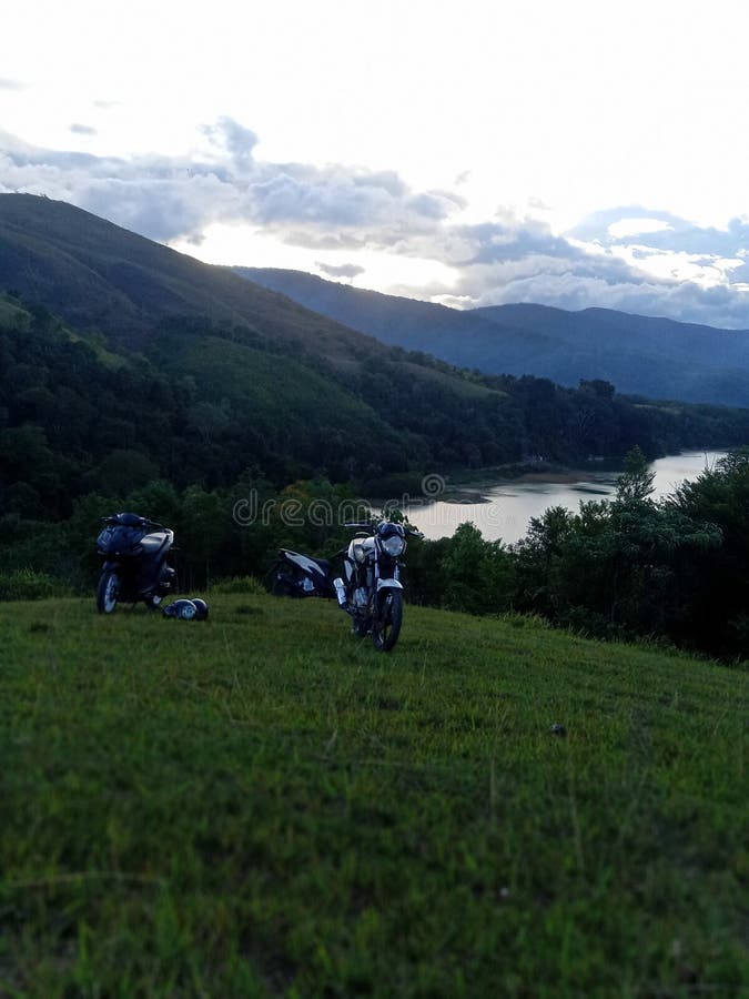Mountain Lake View and Two Wheeled Vehicles Stock Photo - Image of ...