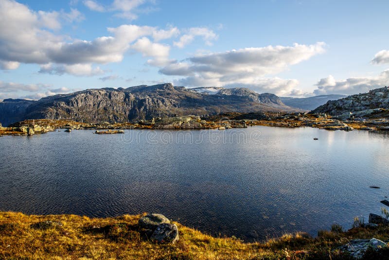 Mountain Lake. Water Surface Surrounded by Rocks Stock Photo - Image of ...