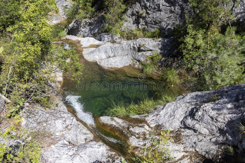 Mountain Lake with Waterfall Stock Photo - Image of sunlight, nature ...