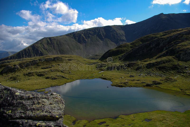 Mountain lake, Yellow lake stock photo. Image of mountaineering - 38011386