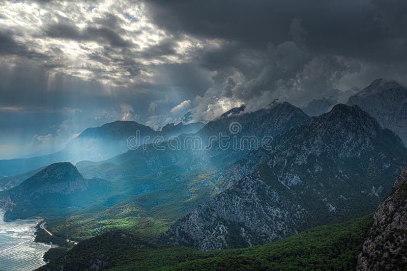 Mountain Landscape with Charming Clouds and Soft Sun Rays Stock Photo ...
