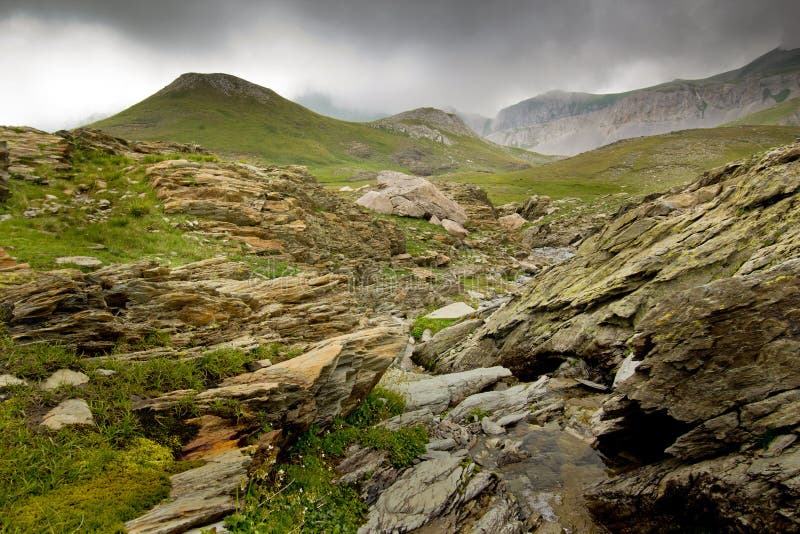 Mountain Landscape with Stones in Foreground Stock Photo - Image of ...