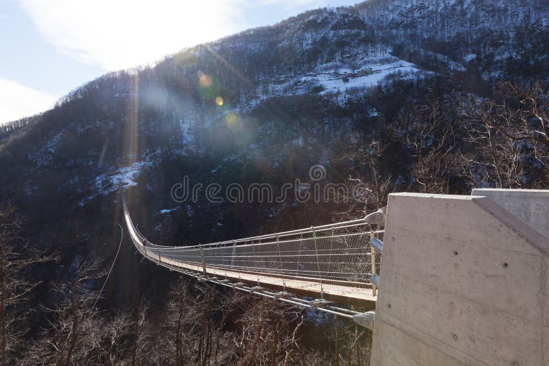 Mountain Landscape with Suspension Bridge Stock Image - Image of dale ...