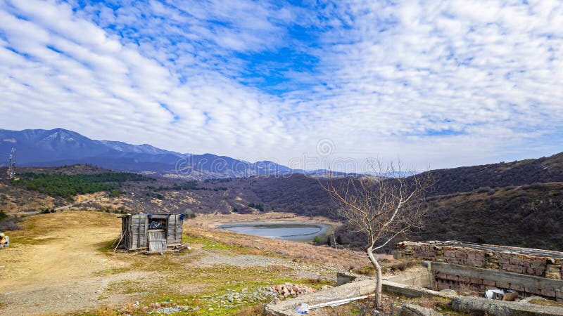 Mountain Landscape with Tree, Barn and Lake Stock Photo - Image of hill ...