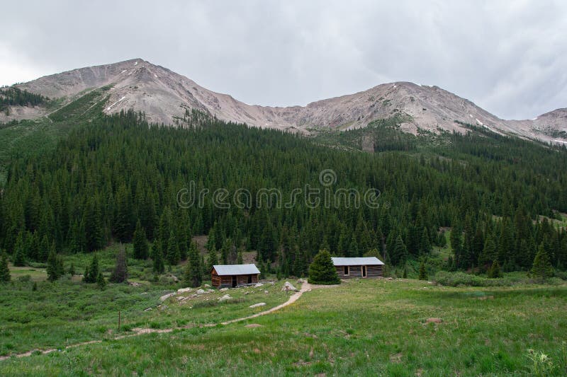 High Elevation Mountain Log Cabins with Alpine Forest Stock Photo ...