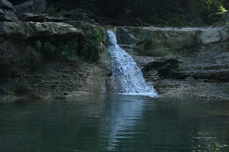 Mountain Low Waterfall with a Small Deep Lake. Mountain Landscape ...