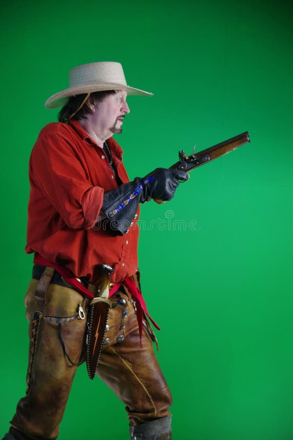 Mountain Man with Muzzle Loader Pistol Stock Photo - Image of holster ...